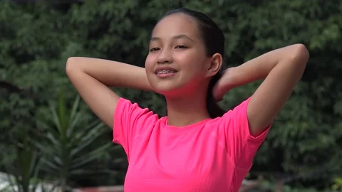 A Female Asian Child Aerobic Exercise | Stock Video | Pond5