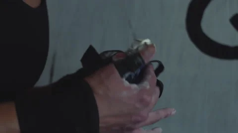Female Athlete taping her hands before w... | Stock Video | Pond5