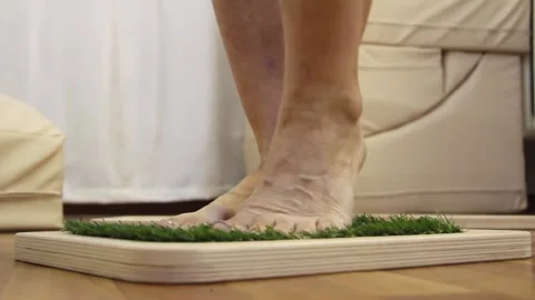 Female bare feet step in place on a wood... | Stock Video | Pond5
