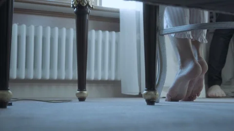 Feet Under Table Stock Videos – Royalty-Free HD & 4K Videos | Pond5