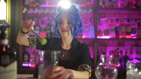 female bartender. girl with blue hair. c... | Stock Video | Pond5
