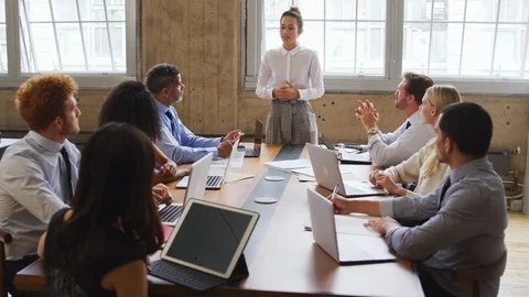 Female boss addressing colleagues in a b... | Stock Video | Pond5
