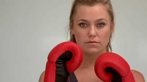 Female boxer being hit with boxing glove | Stock Video | Pond5