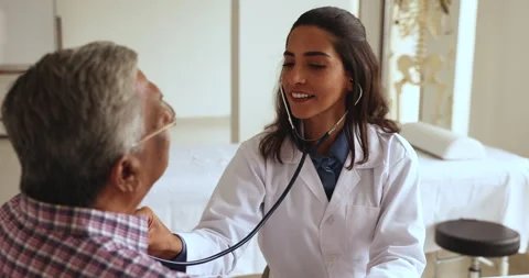 Female cardiologist check heart rate of ... | Stock Video | Pond5