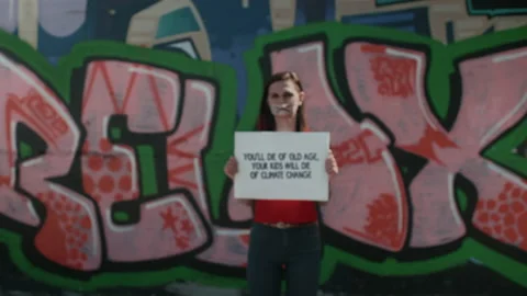 Female caucasian activist protest, graff... | Stock Video | Pond5