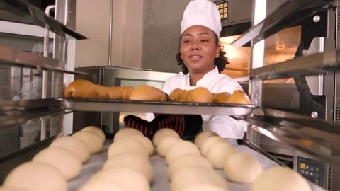 Female chef in uniform prepare to bake b... | Stock Video | Pond5