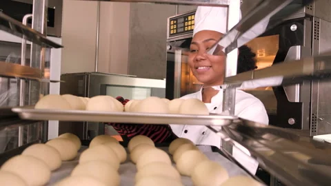 Female chef in uniform prepare to bake b... | Stock Video | Pond5