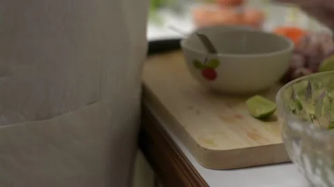Female chef using spoon and fork mixing ... | Stock Video | Pond5