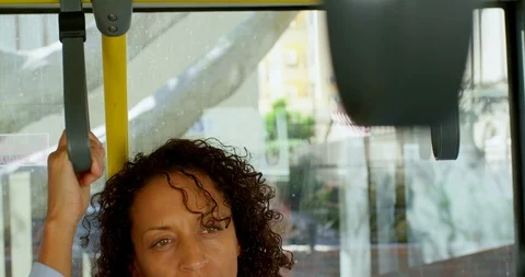 Female commuter travelling in bus 4k | Stock Video | Pond5