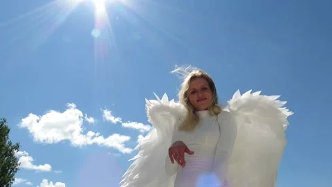 A female dancer in the image of an angel... | Stock Video | Pond5
