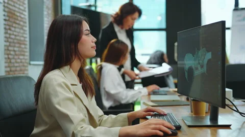 Female designer using computer to design... | Stock Video | Pond5