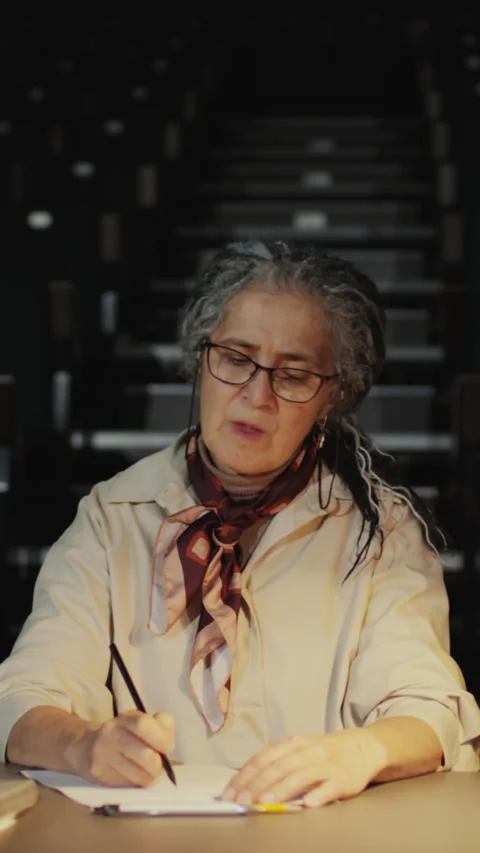 Female Director Writing Notes and Asking... | Stock Video | Pond5