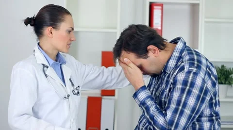 Female doctor telling bad news to male p... | Stock Video | Pond5