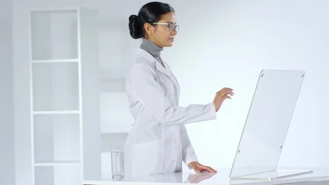 Female Doctor Working on Invisible Futur... | Stock Video | Pond5