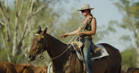 Female Drover with her horse Droving Cat... | Stock Video | Pond5
