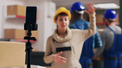 Female employee filming video ad in stor... | Stock Video | Pond5