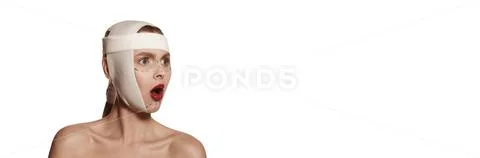 Female face bandaged with medical bandages human emotions. Making ...
