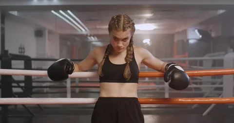 Female fighter stands near the boxing ri... | Stock Video | Pond5