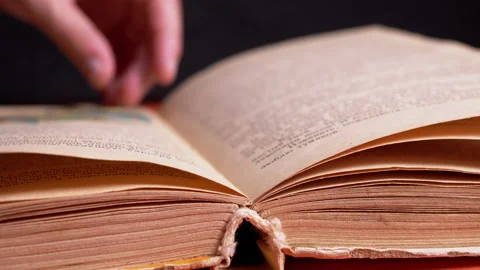 Female Fingers Leafing Through Pages of ... | Stock Video | Pond5