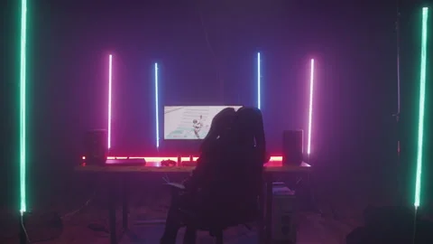 Female Gamer Sitting at Her Lit up Gamin... | Stock Video | Pond5