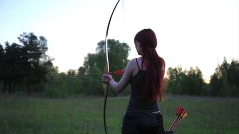 Female ginger hair archer shooting targe... | Stock Video | Pond5