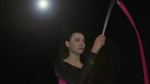 Female Gymnast using Ribbons during a Gy... | Stock Video | Pond5