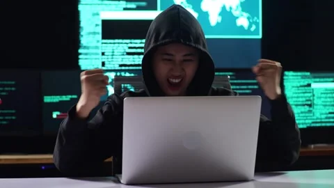 Female Hacker Celebrating Succeed By A L... | Stock Video | Pond5