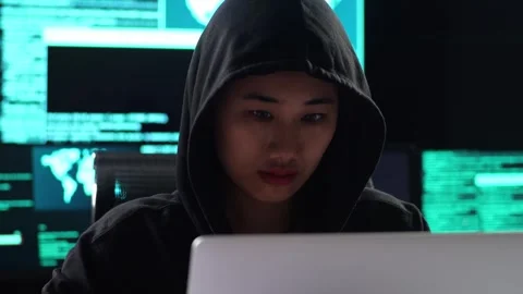 Female Hacker In A Hood While Works On A... | Stock Video | Pond5