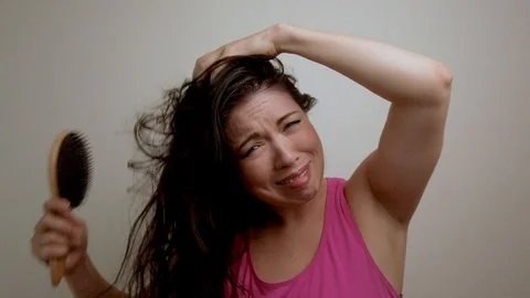 Messing Hair Stock Videos – Royalty-Free HD & 4K Videos