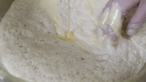Female Hand Stirring Foamy Yeast Dough i... | Stock Video | Pond5