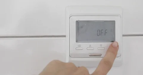 Female hand on a temperature sensor on a... | Stock Video | Pond5