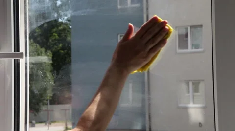 female hand washing the window | Stock Video | Pond5