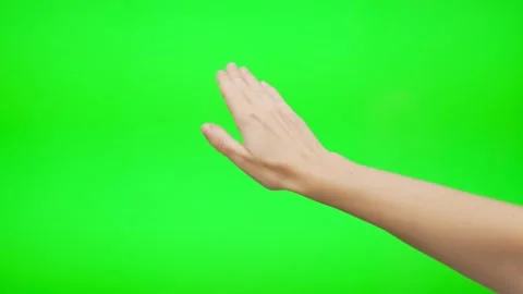 Female Hand Waving on a Green Background... | Stock Video | Pond5