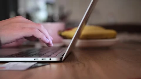 Female hands fast typing on keyboard lap... | Stock Video | Pond5