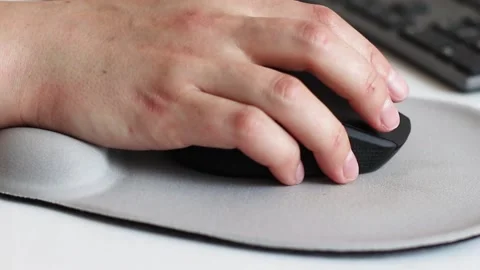Female hands holding computer mouse on l... | Stock Video | Pond5