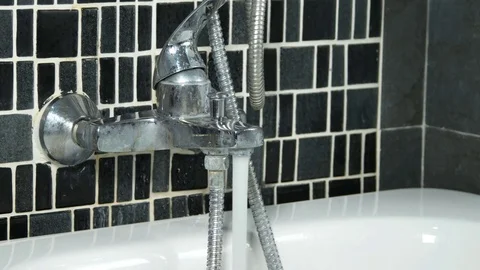 female hands Turn off water tap at showe... | Stock Video | Pond5