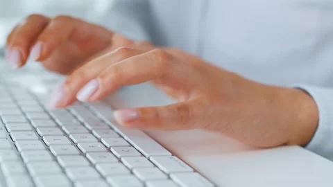 Female hands typing on a computer keyboa... | Stock Video | Pond5