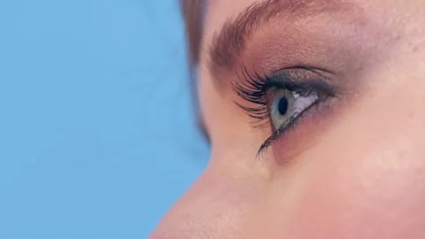 Female Human eye closeup. Side view. Gir... | Stock Video | Pond5