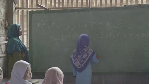 A female Imam at an Islamic School in Ma... | Stock Video | Pond5