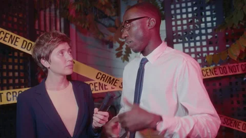 Female Journalist Interviewing Police Of... | Stock Video | Pond5