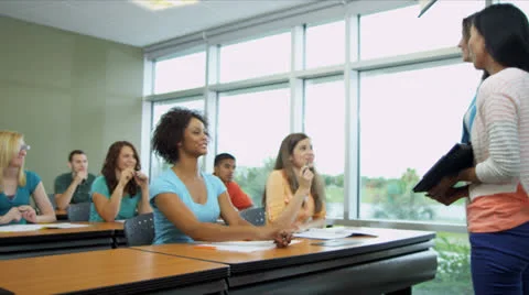 Female Lecturer Working Classroom Teenag... | Stock Video | Pond5
