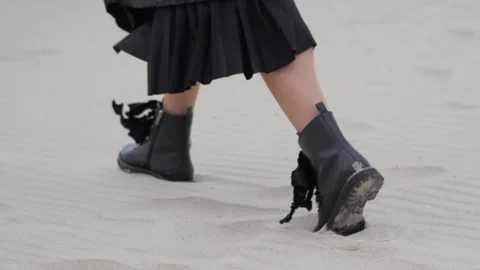 Female Legs and Feet in Boots Walking al... | Stock Video | Pond5