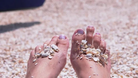 Woman Wiggling Sandy Feet Stock Footage ~ Royalty Free Stock Videos | Pond5