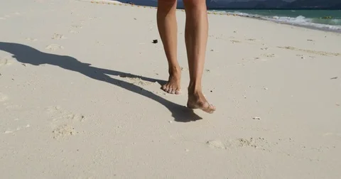 Female Legs Walking On Beach Closeup, Wo... | Stock Video | Pond5