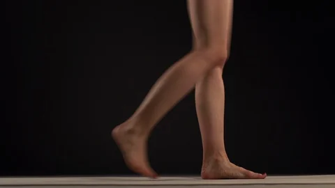 female legs walking side to side against... | Stock Video | Pond5