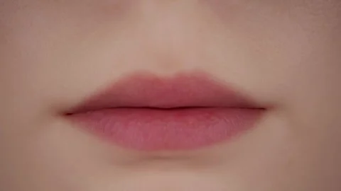 female lips closeup, neutral emotions, d... | Stock Video | Pond5
