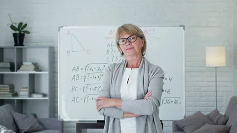 Female Math Teacher Standing In Classroo... | Stock Video | Pond5