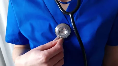 Female medicine doctor hand holding stet... | Stock Video | Pond5