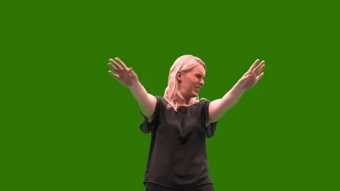 Female model on green screen stands wavi... | Stock Video | Pond5