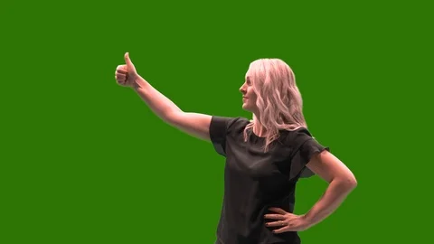 Female model on green screen stands with... | Stock Video | Pond5